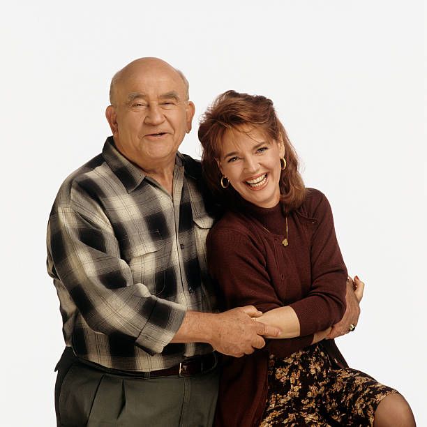 Ed Asner, Robin Riker