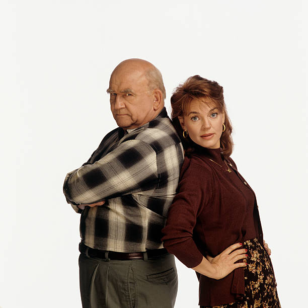 Ed Asner, Robin Riker