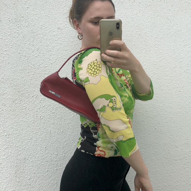 Picture of 90s mesh top \nLike green, black and red \nTie dye...