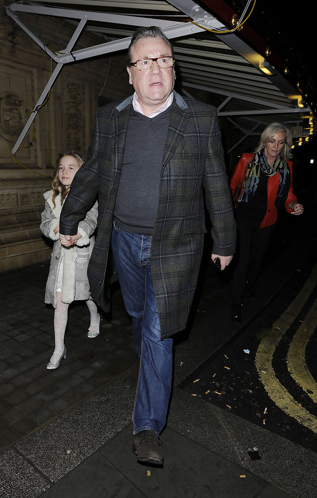 Ray Winstone holds onto his daughter Ellie Raé's h