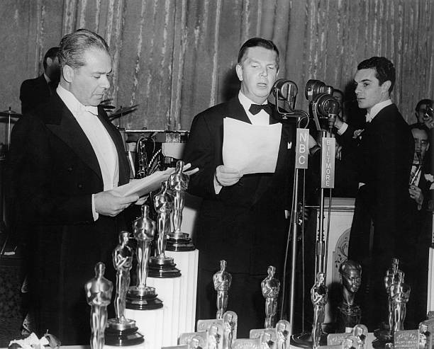 Walter Wanger, Ken Carpenter, Chuck Foster