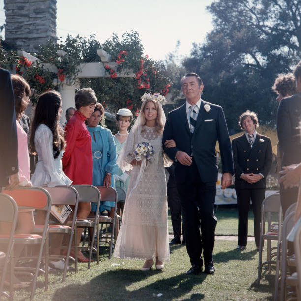 Monie Ellis, Macdonald Carey