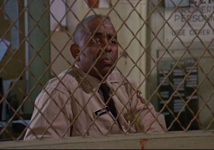 Matthew Beard as Jail Guard in Truck Turner