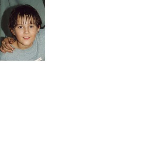 Harry Newell getting a hug in his sandals during t