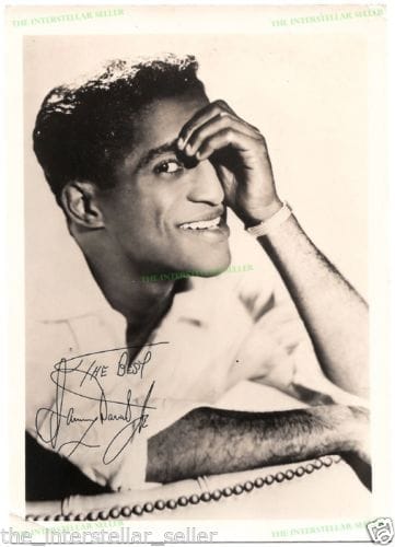 Sammy Davis Jr. Smiling with one eye covered